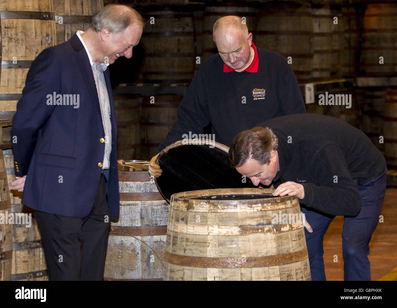 Prime Minister David Cameron with the Bushmills Distillery cooper and ...