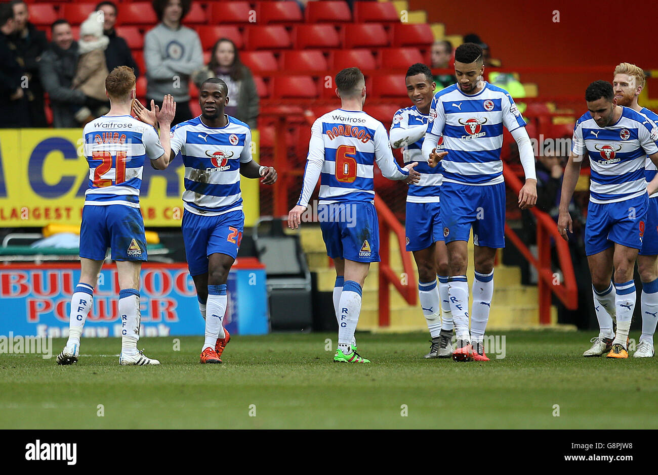 Reading's Ola John (second left) celebrates scoring his side's third ...