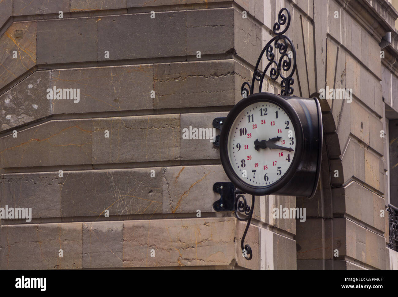 Big clock on a facade Stock Photo - Alamy