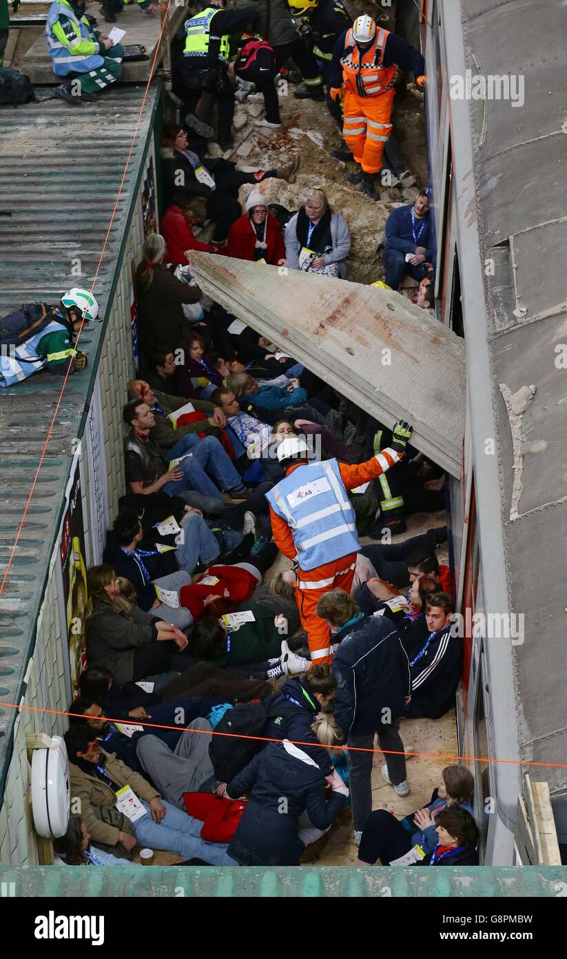 Volunteers play the role of disaster victims during Exercise Unified ...