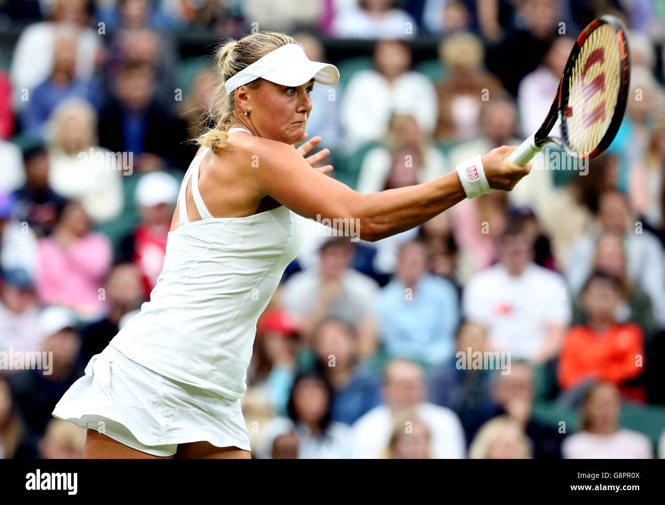 Kateryna Kozlova in action against Agnieszka Radwanska on day Three of ...