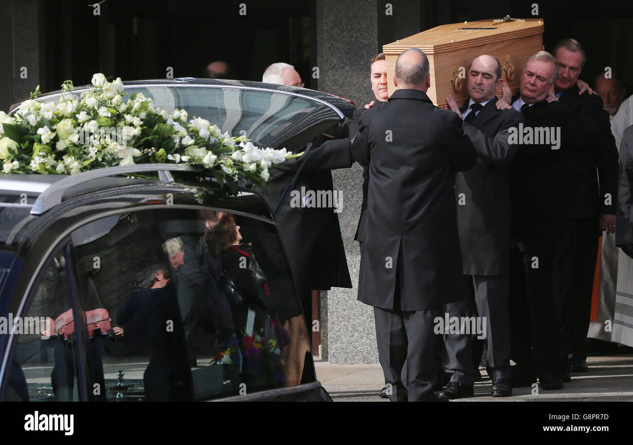 Pallbearers carry the coffin of the late actor Frank Kelly, best known ...