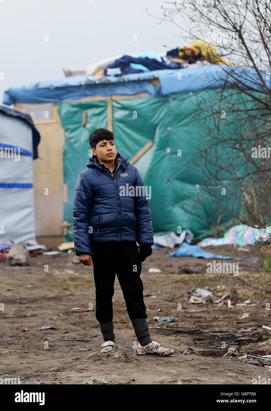 A young migrant in the Calais migrant camp, known as the Jungle ...
