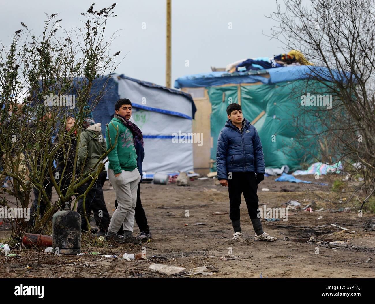 Young migrants in the calais migrant camp hi-res stock photography and ...