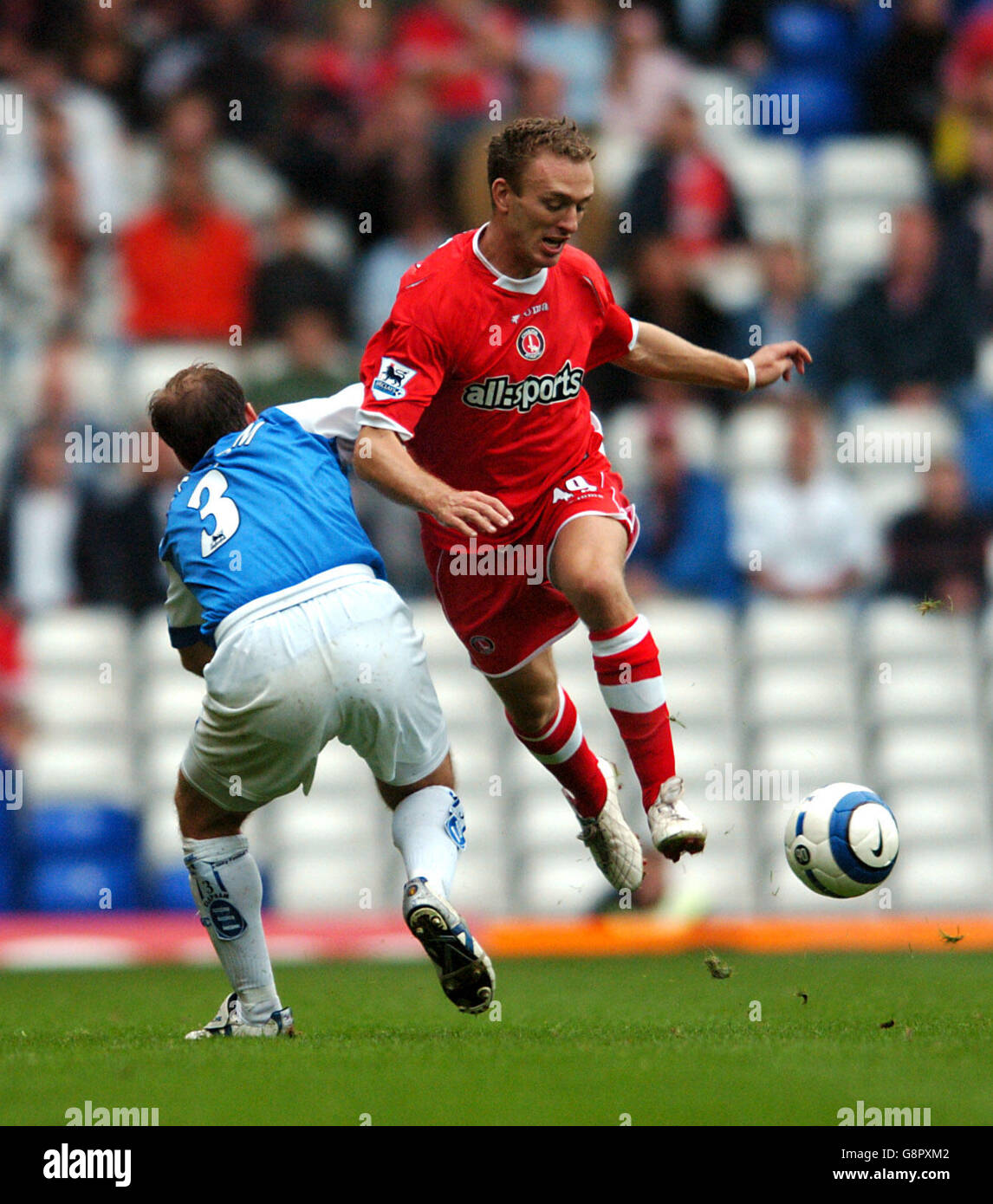 Birmingham City's Jamie Clapham and Charlton Athletic's Dennis ...