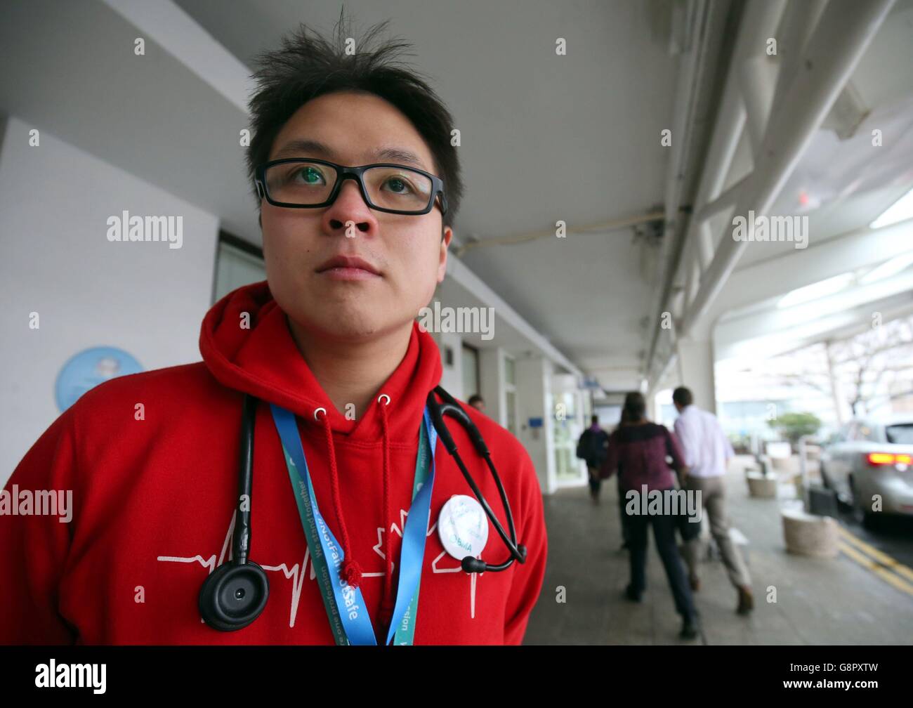 Dr Anthony Ng on the picket line outside Addenbrooke's Hospital in ...