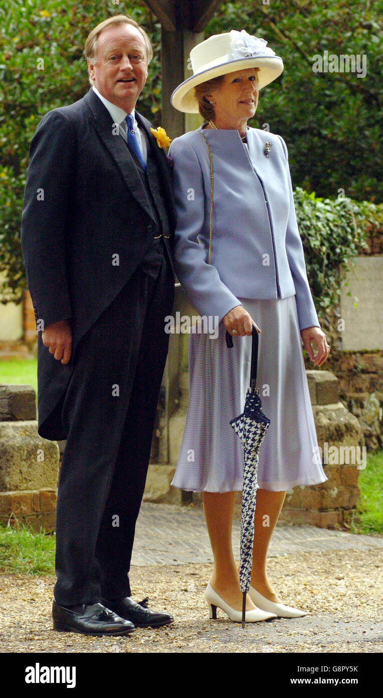 Andrew Parker Bowles arrives with his wife for the wedding of his son ...