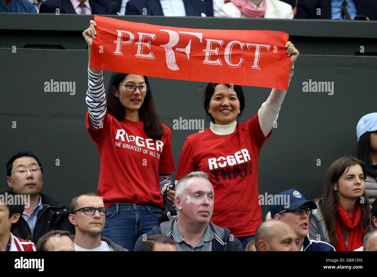 Roger Federer fans on centre court on day Three of the Wimbledon ...
