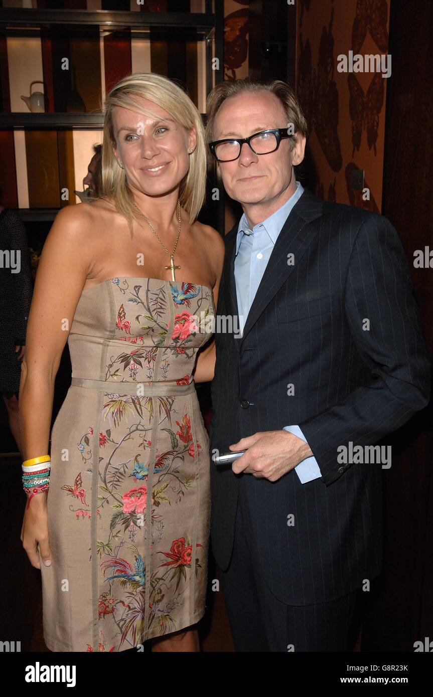 Three quarter length smiling celebrity author actor hi-res stock ...