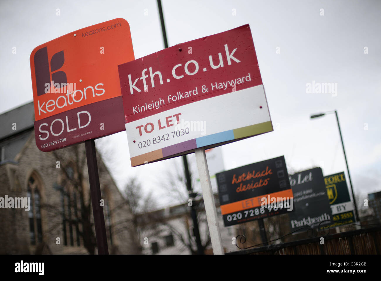 Row of sold signs hi-res stock photography and images - Alamy