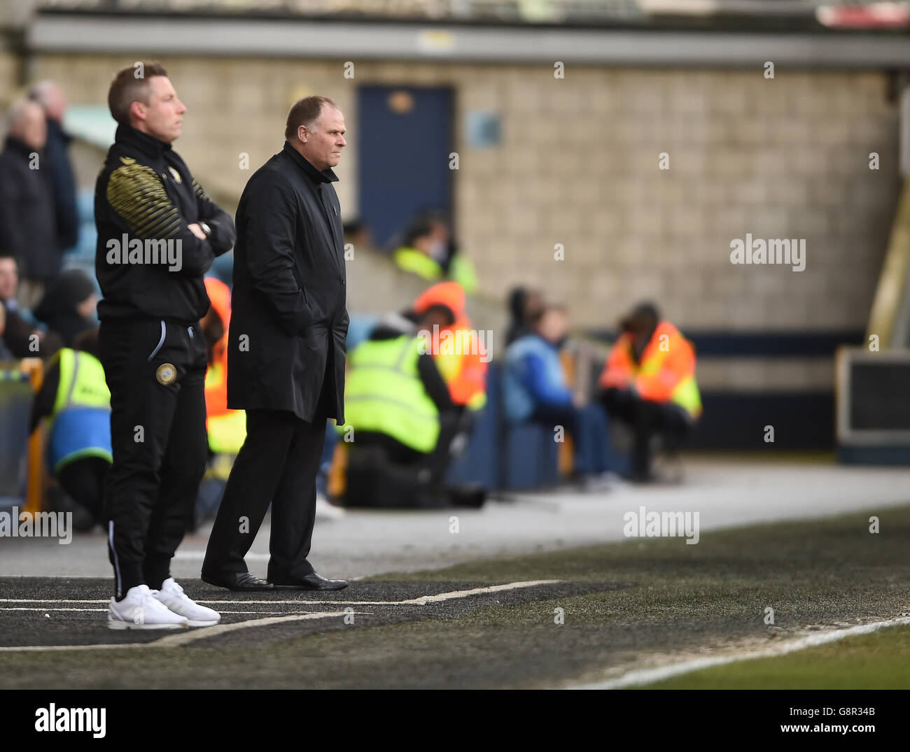 Millwall manager Neil Harris (left) and Blackpool manager Neil McDonald ...
