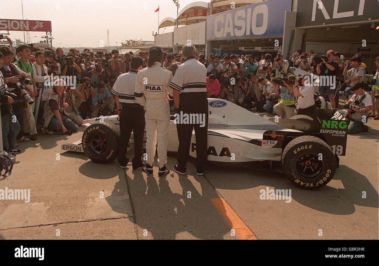 The Tyrrell team are surrounded by photographers as they announce their ...