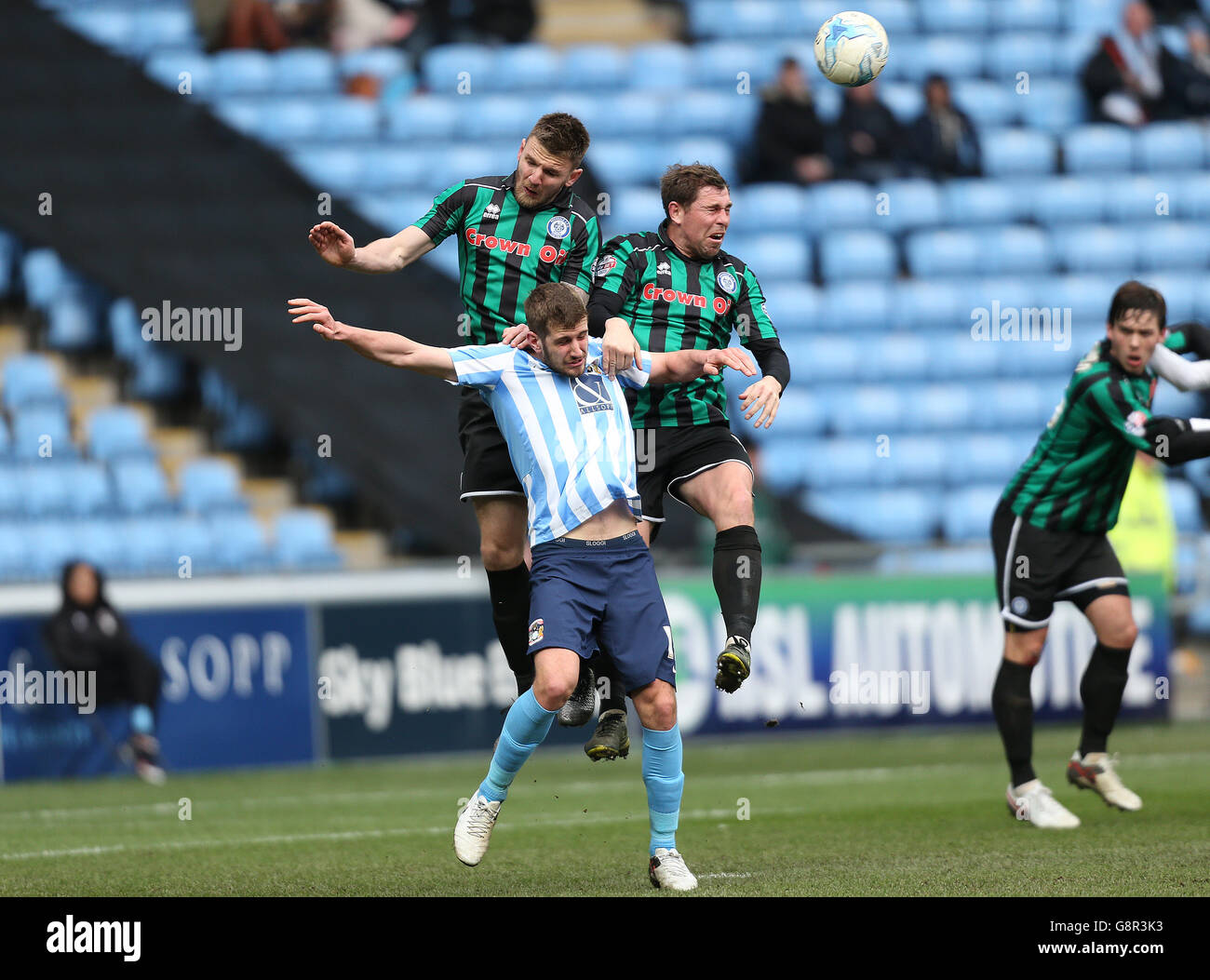 Coventry City's Jack Stephens and Rochdale's Ashley Eastham and Grant ...