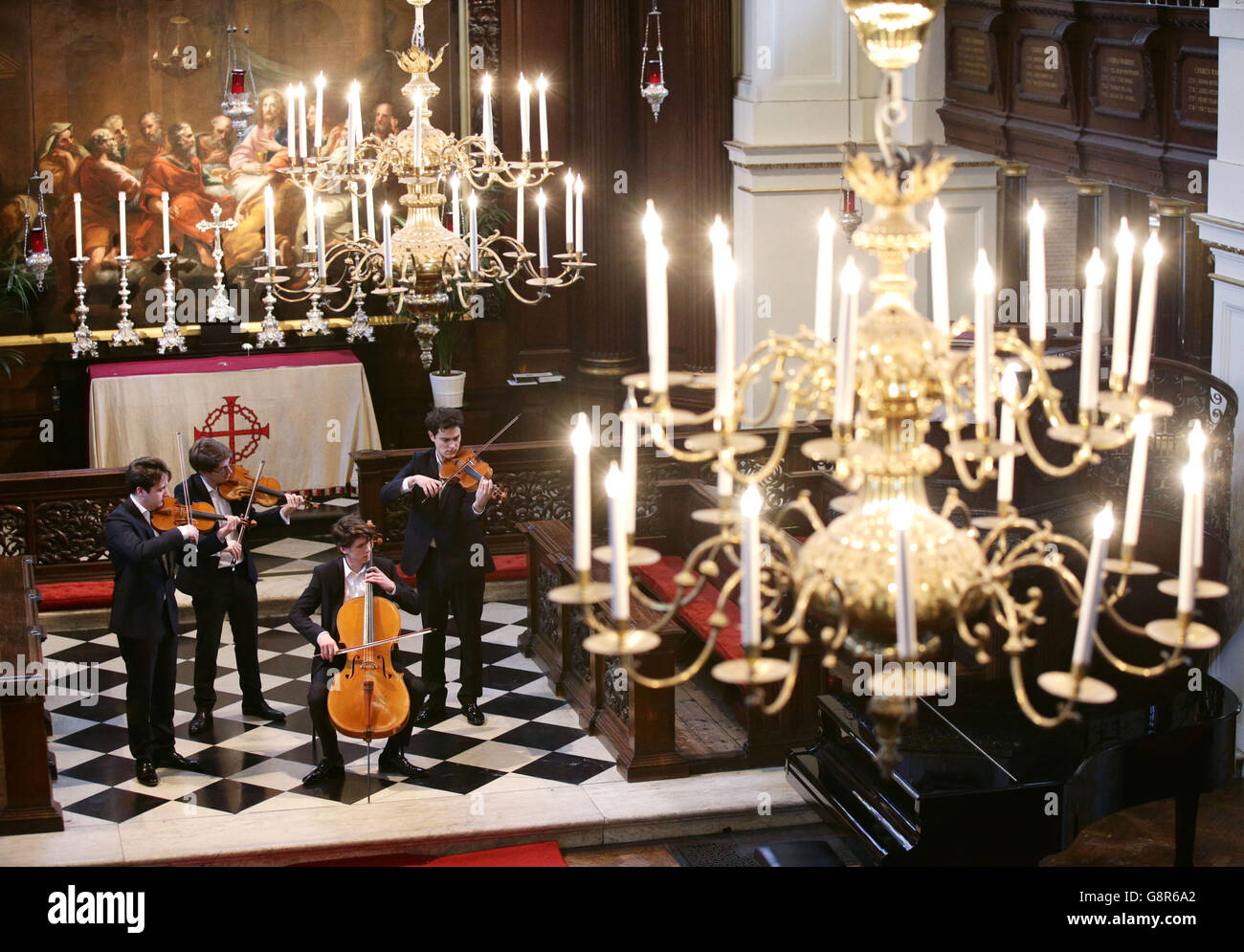 The Ruisi Quartet (left to right) Alessandro Ruisi (playing violin ...