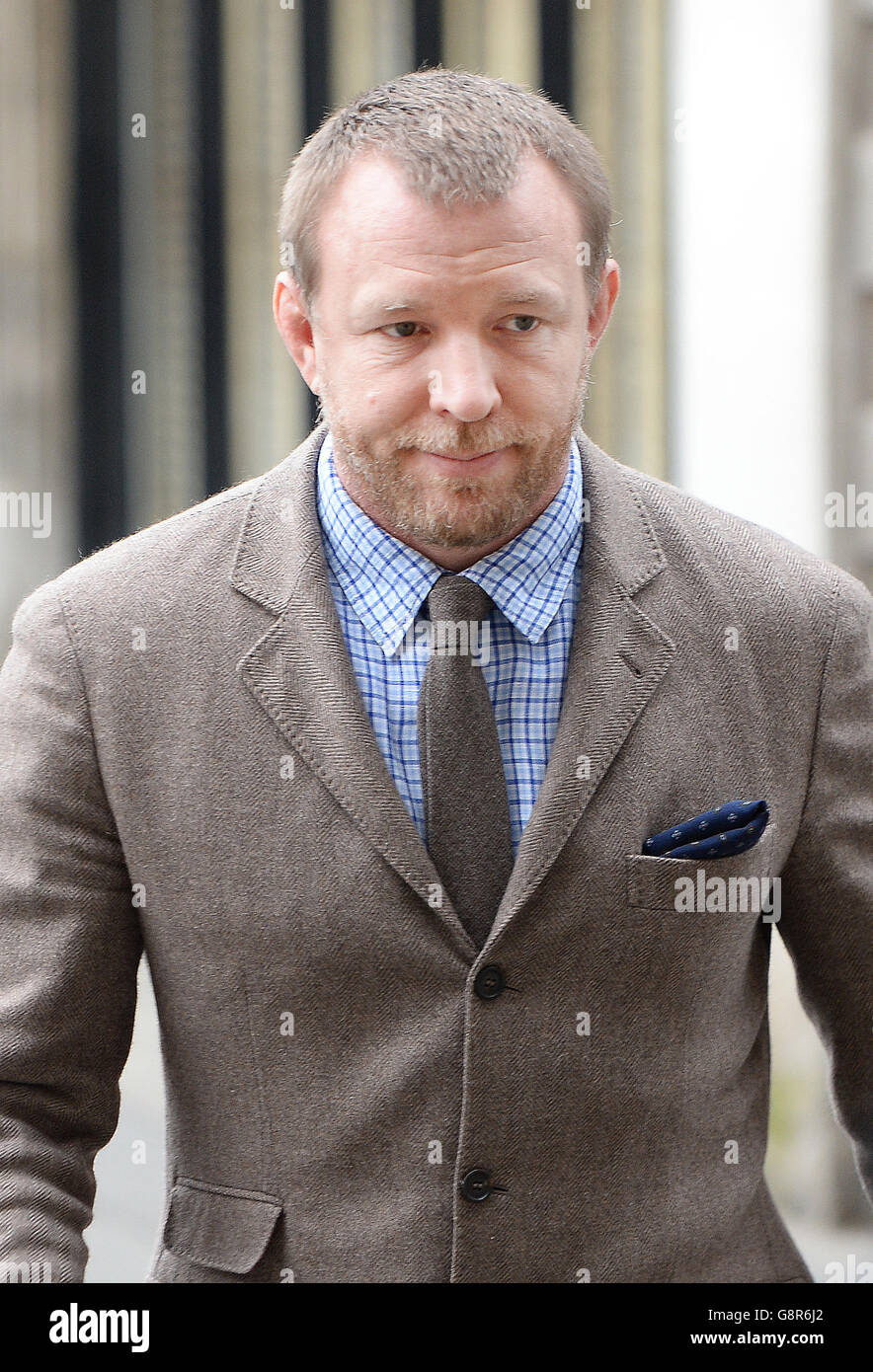 Guy Ritchie arrives at the Royal Courts of Justice in central London to ...