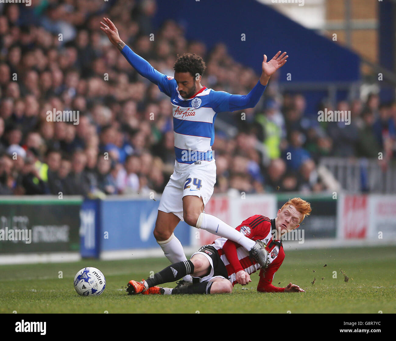 Queens Park Rangers' James Perch and Brentford's Ryan Woods (right ...