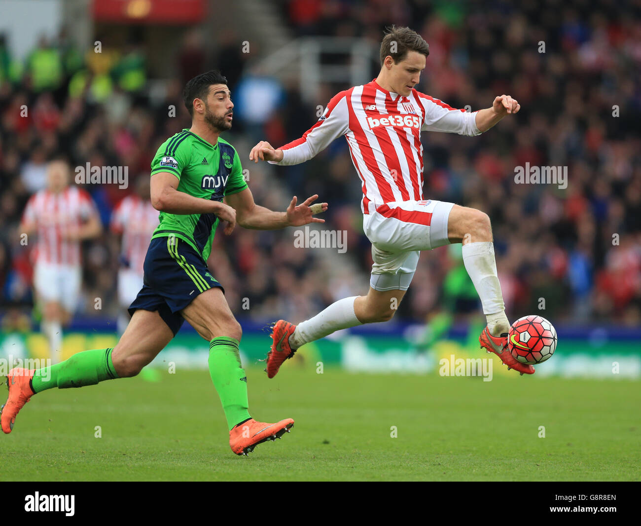 Stoke City's Philipp Wollscheid (right) and Southampton's Graziano ...