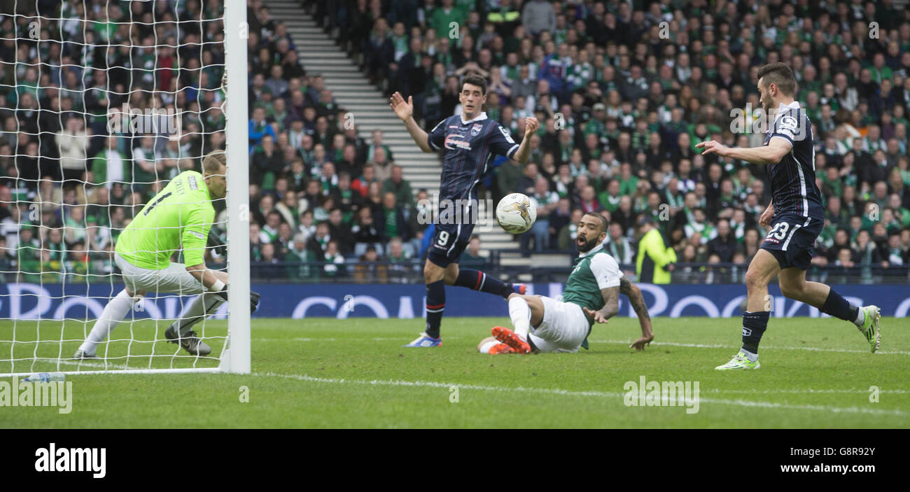 Ross County Alex Schalk (right) scores his side's second goal of the ...