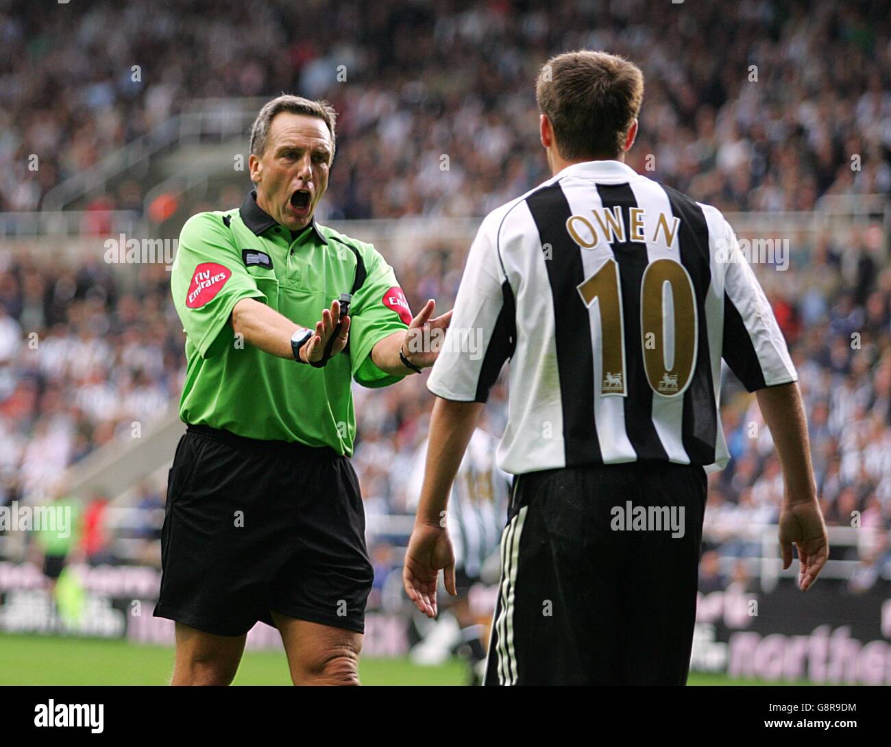 Referee Alan Wiley has words with Newcastle United's Michael Owen Stock ...