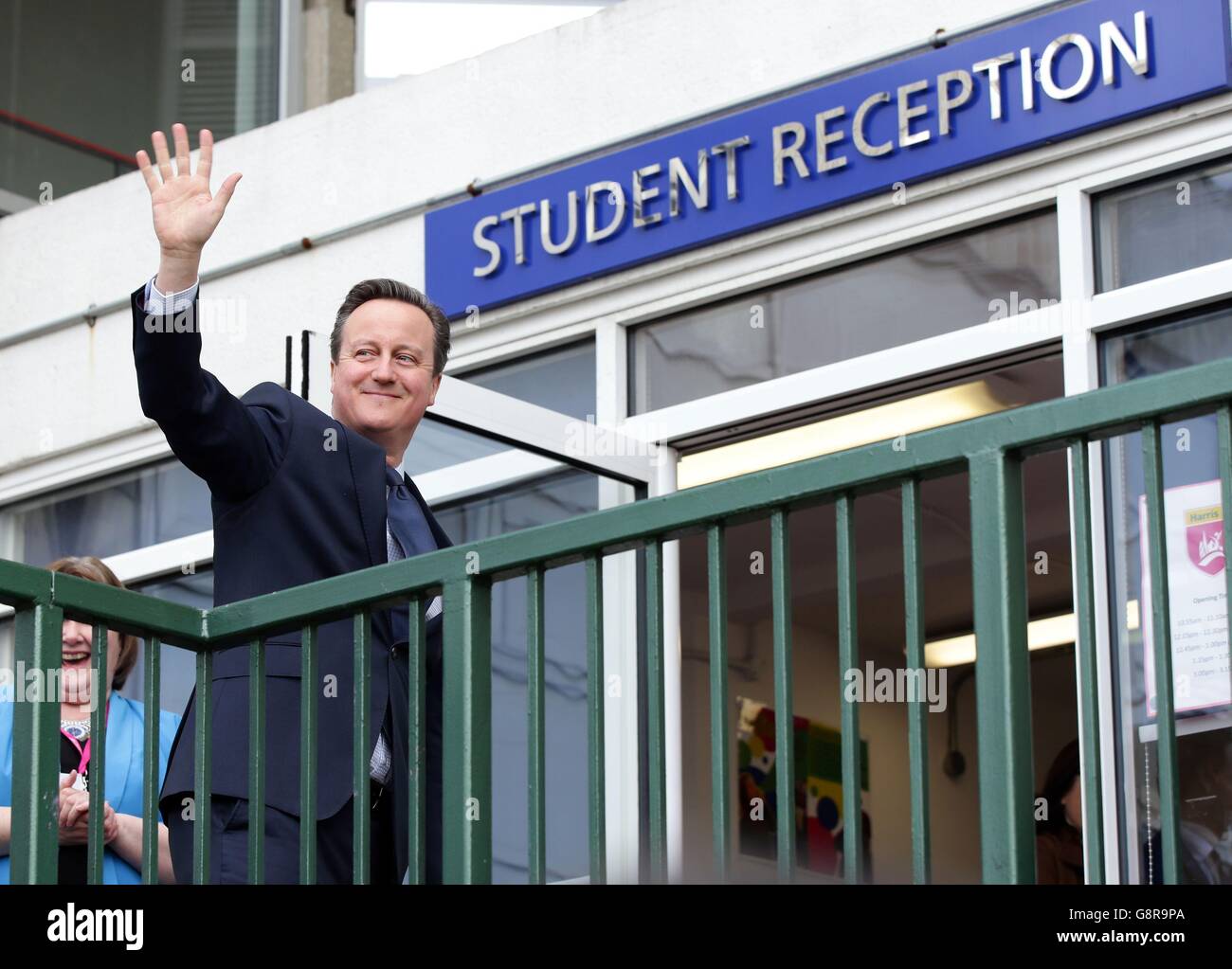 Prime Minister David Cameron waves during his visit to Harris Academy ...