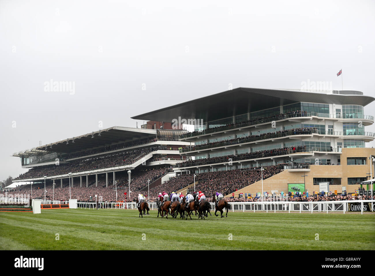 Riders pass grandstand hi-res stock photography and images - Alamy
