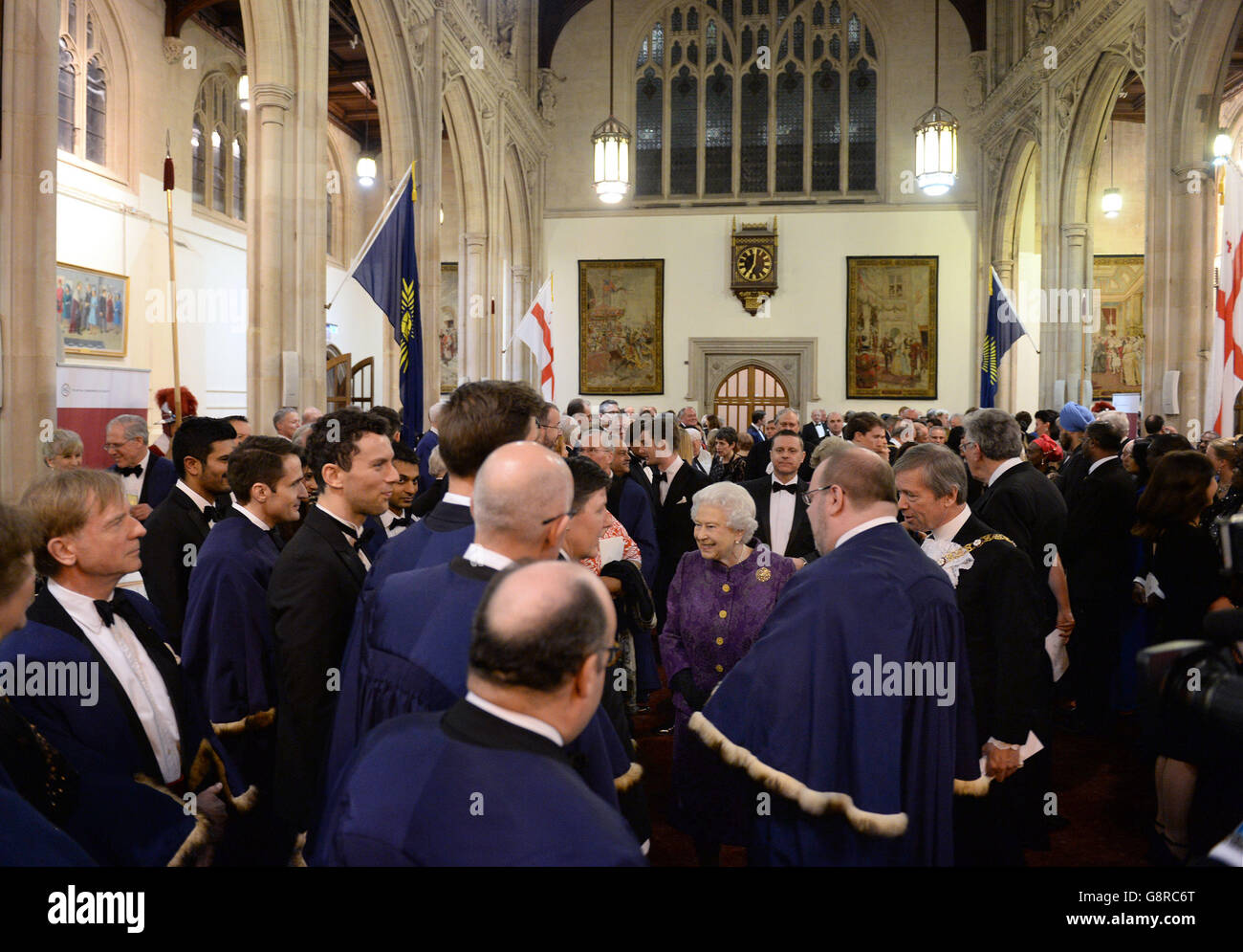 Queen Elizabeth II meets guests at a reception to mark Commonwealth ...