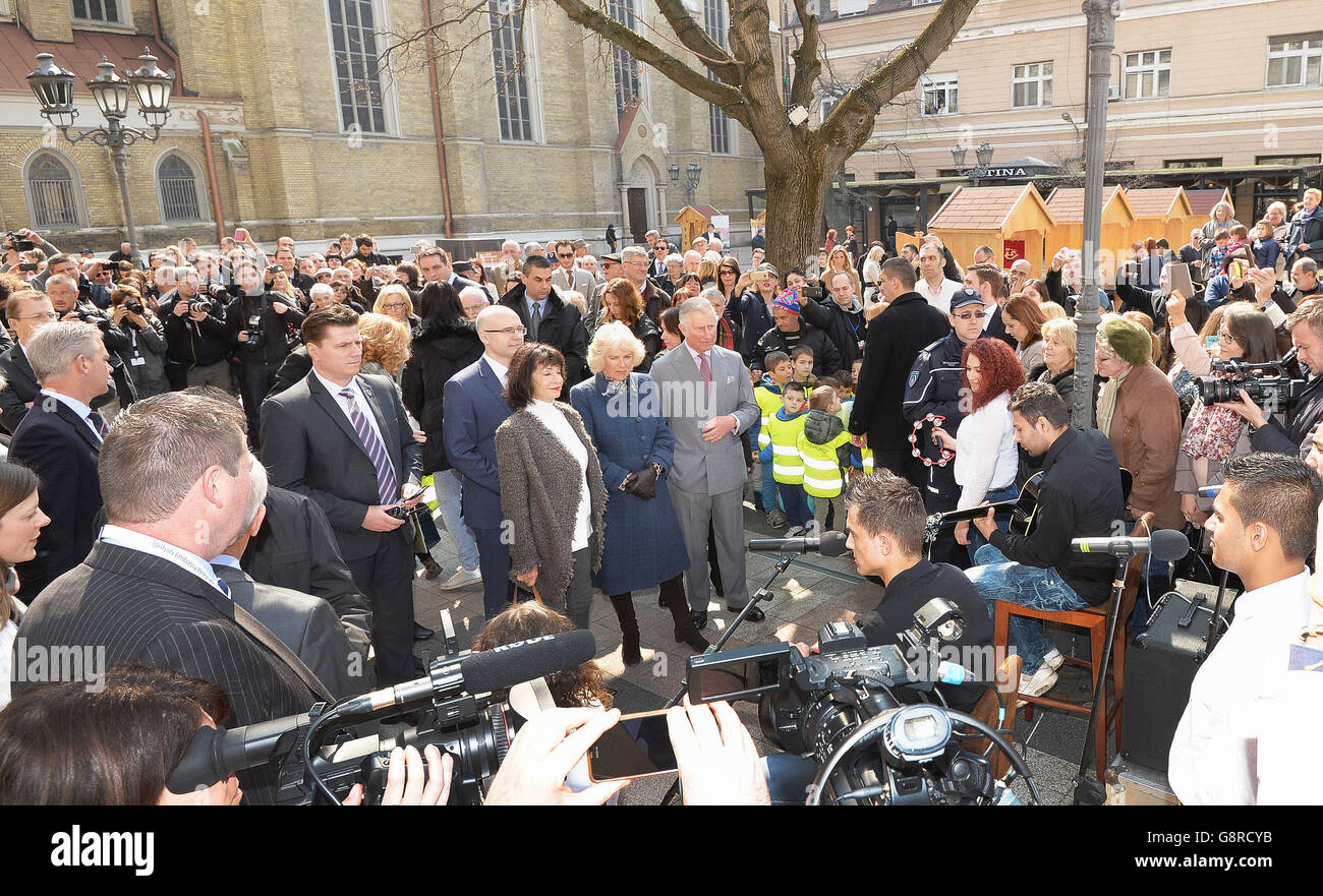 The Prince of Wales and Duchess of Cornwall listen to a Roma band ...