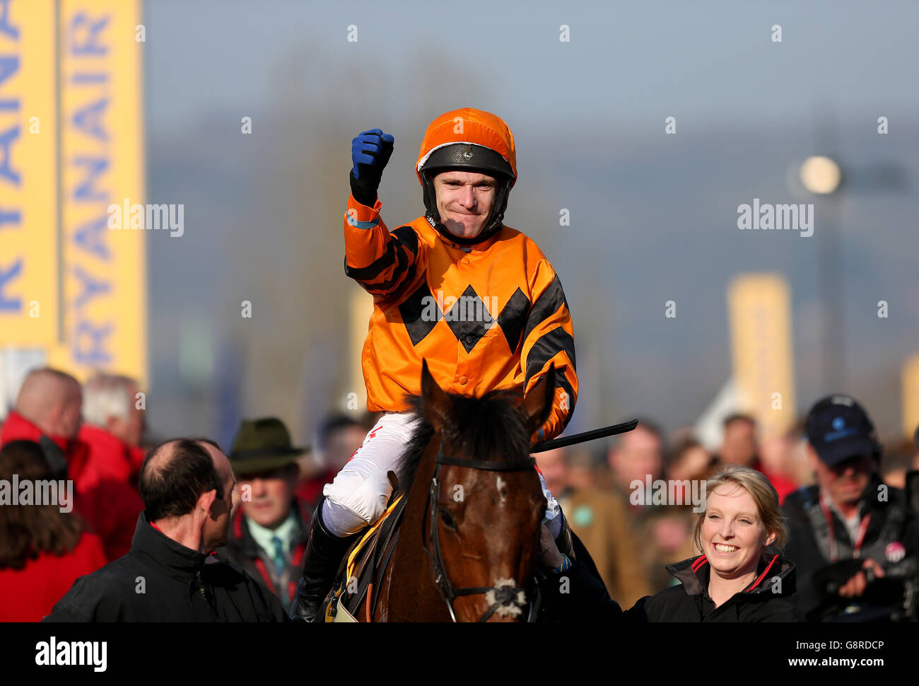 Jockey Tom Scudamore, on Thistlecrack, celebrates winning the Ryanair ...