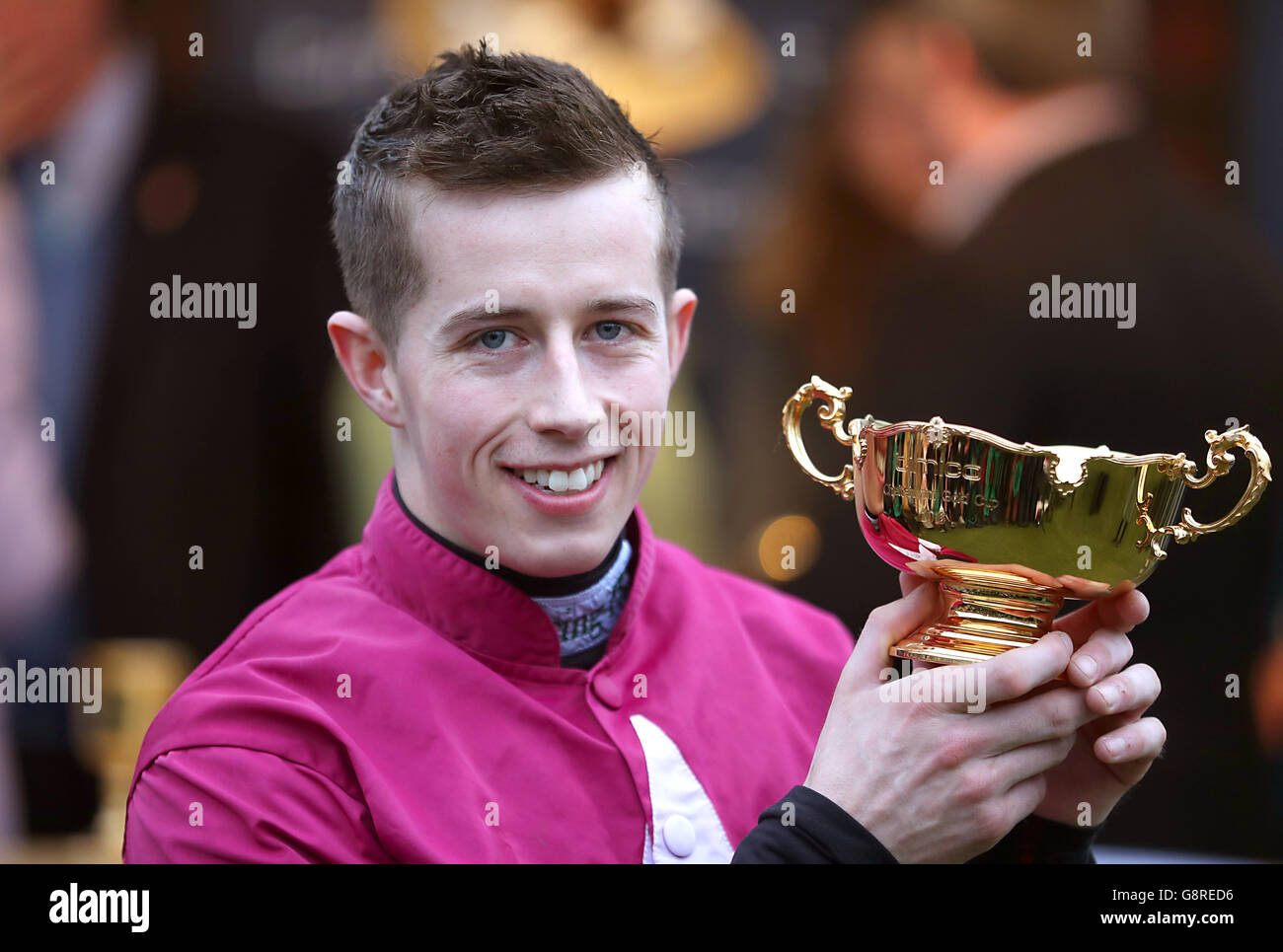 Jockey Bryan Cooper with the Timico Cheltenham Gold Cup after winning ...