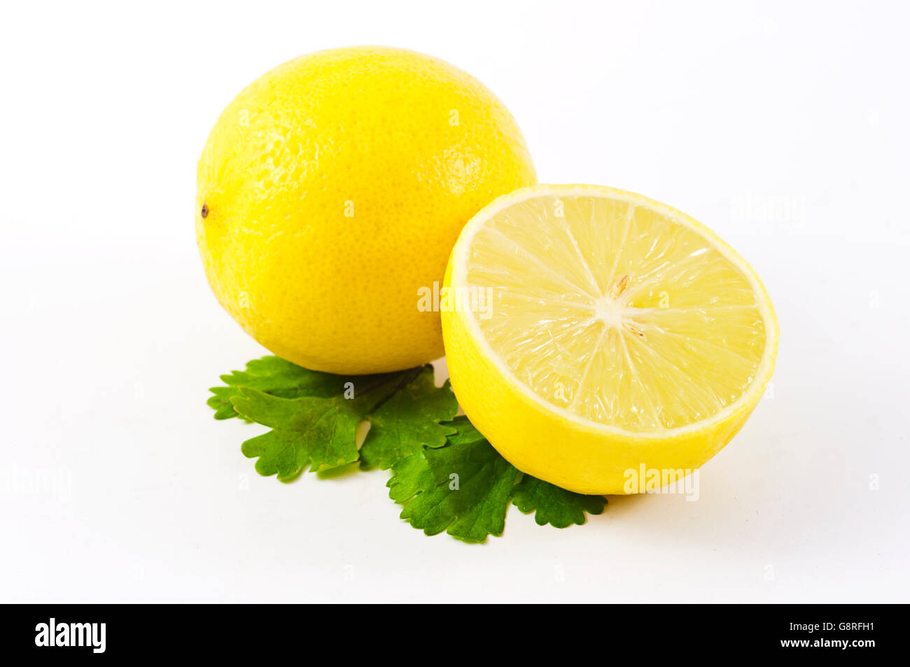 Full and Half Juicy Lemon Stock Photo - Alamy