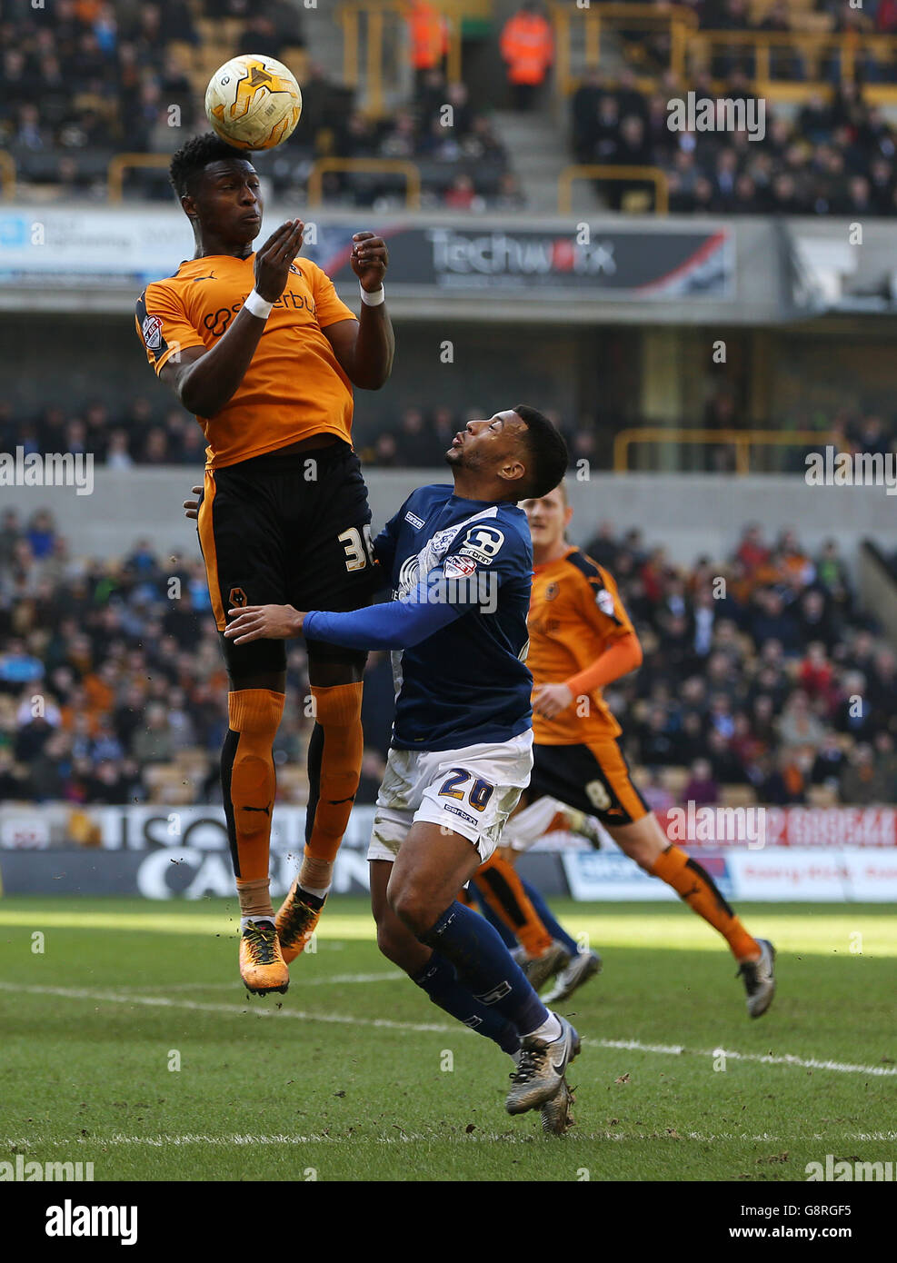 Birmingham's David Davis and Wolves' Kortney Hause (left) battle for ...