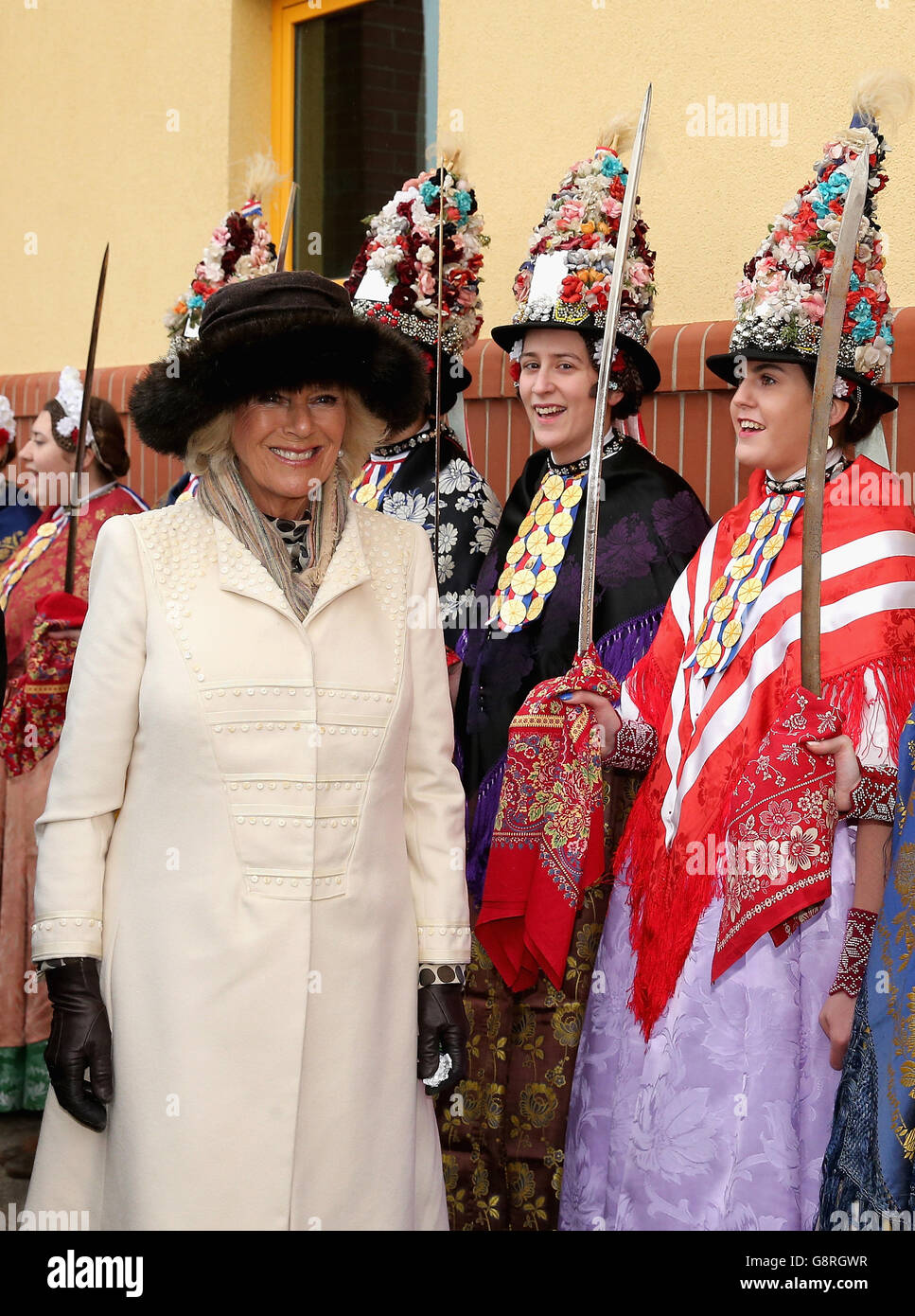 The Duchess of Cornwall meets women in traditional dress as she visits ...