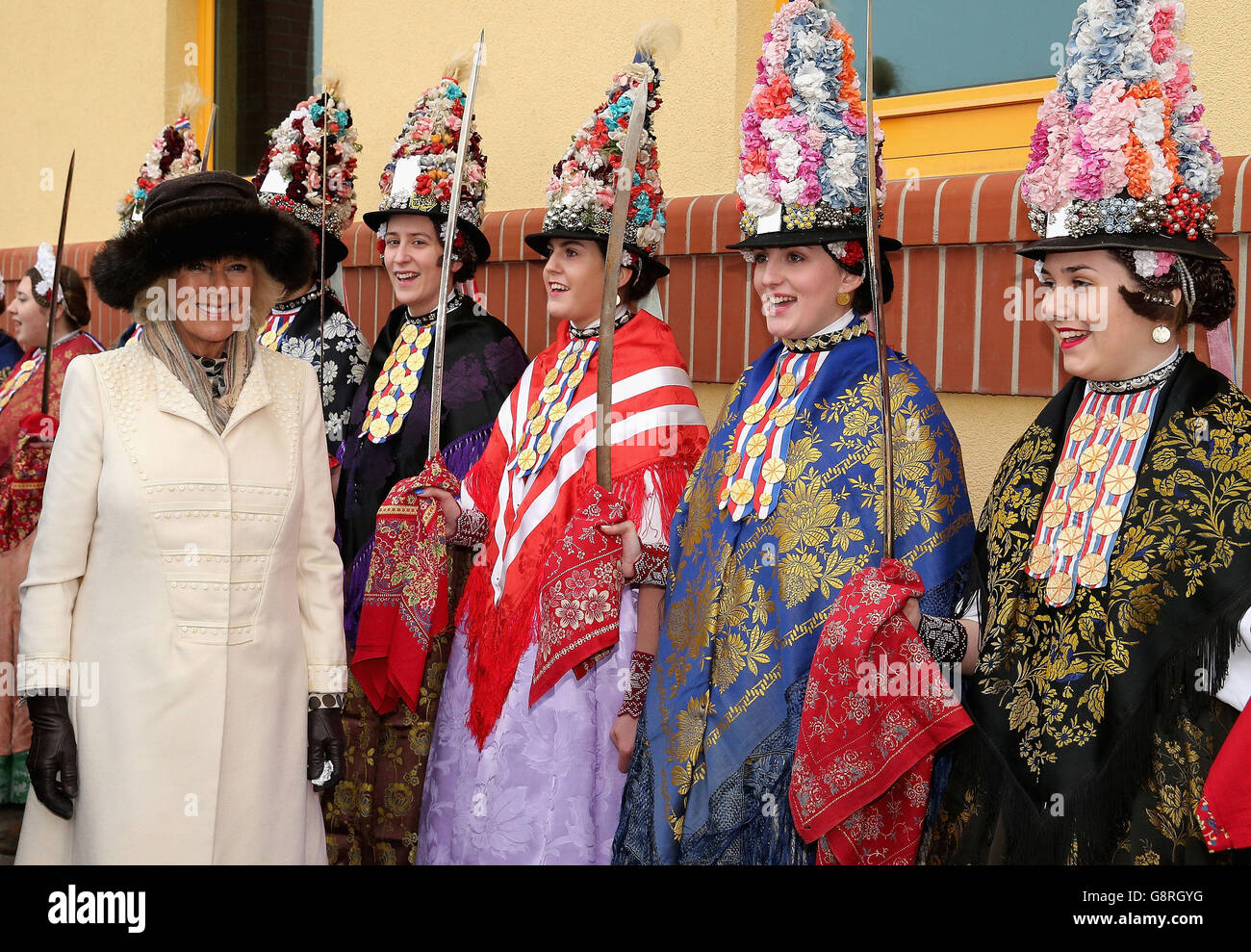 The Duchess of Cornwall meets women in traditional dress as she visits ...