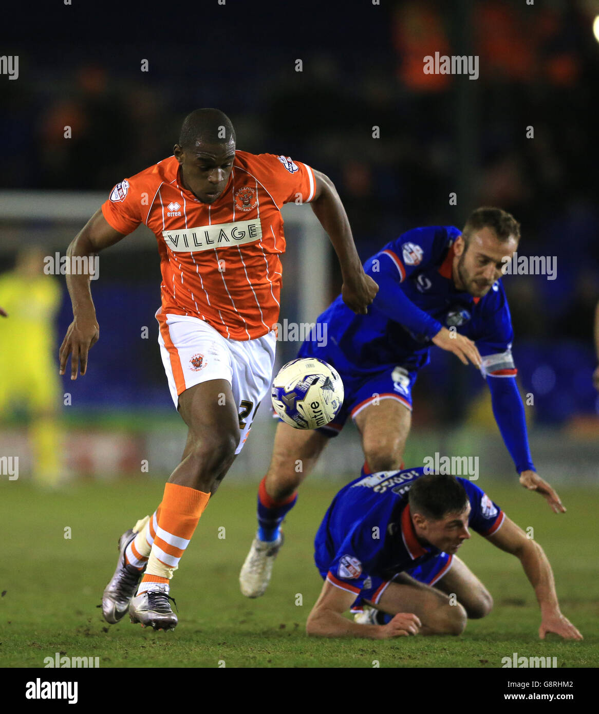 Oldham Athletic's Liam Kelly (back right) and Blackpool's Uche Ikpeazu ...