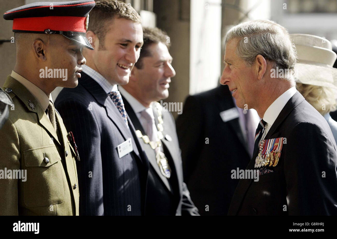 The Prince of Wales and the Duchess of Cornwall (behind the Prince ...