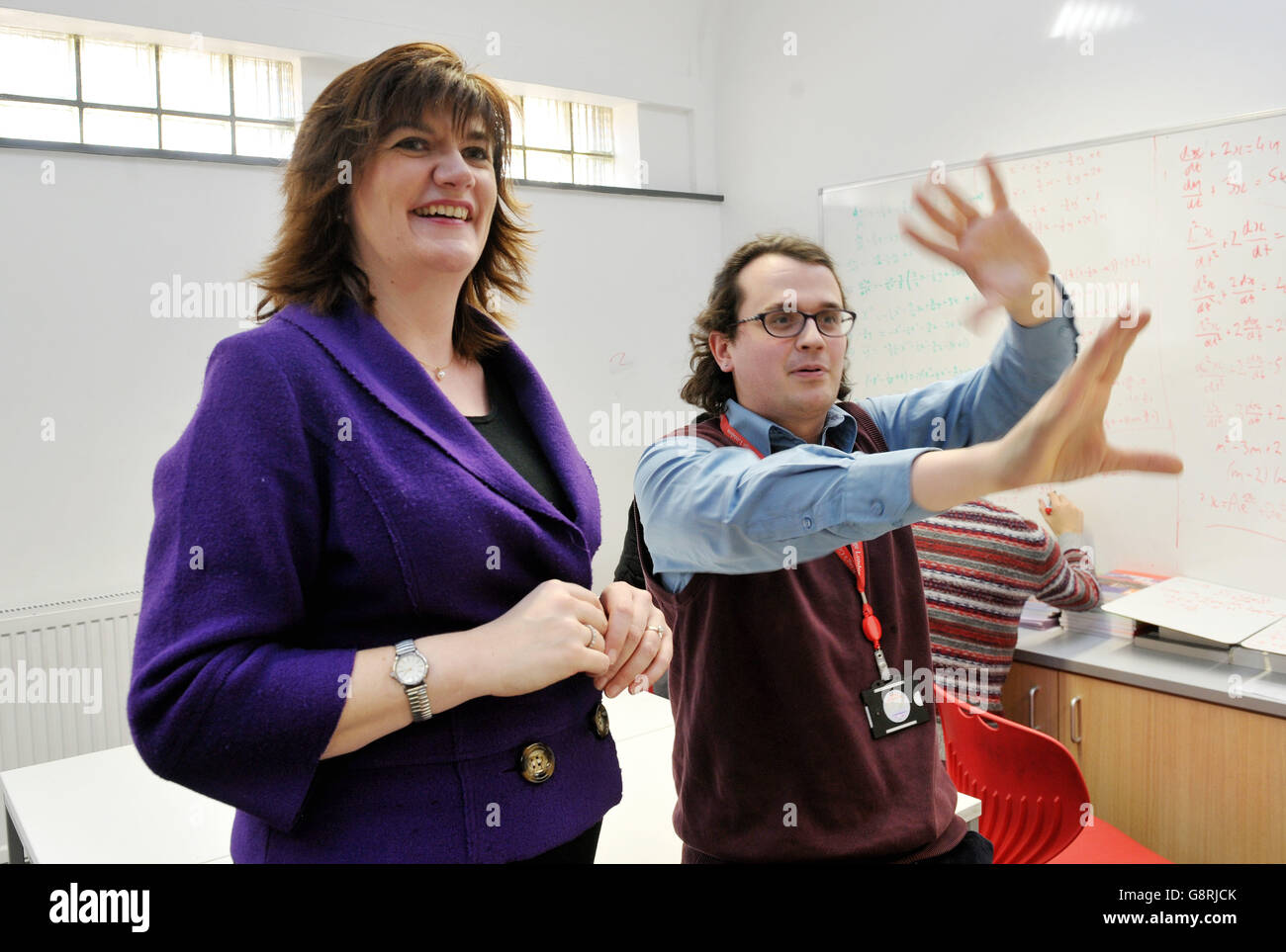 Education Secretary Nicky Morgan, talks with maths teacher James Robson ...