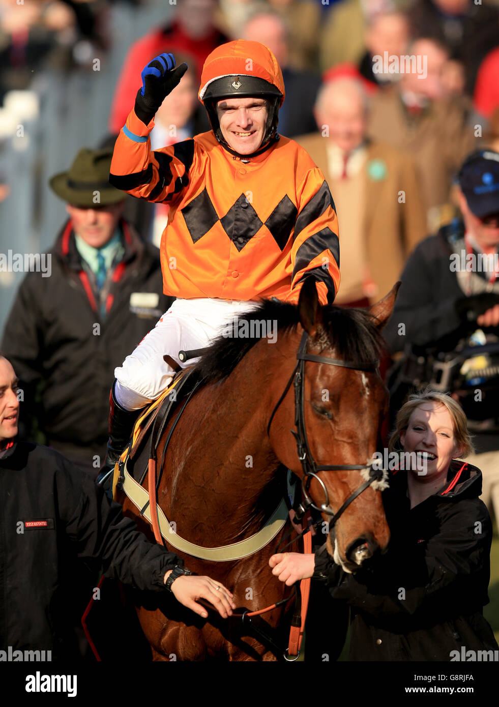 Jockey Tom Scudamore celebrates winning the Ryanair World Hurdle on ...
