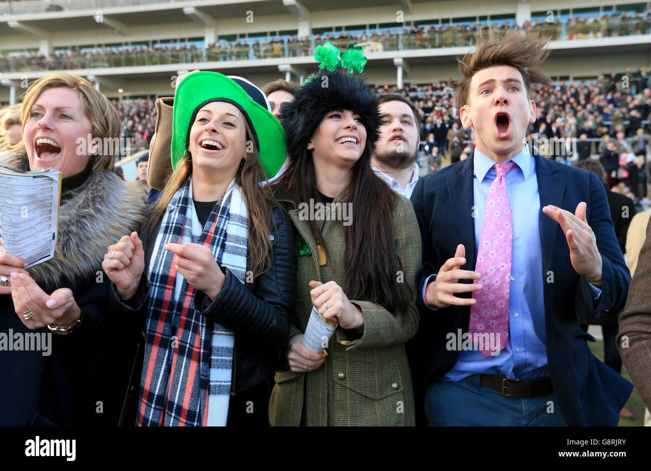 Racegoers cheer on the horses during the Trull House Stud Mares ...