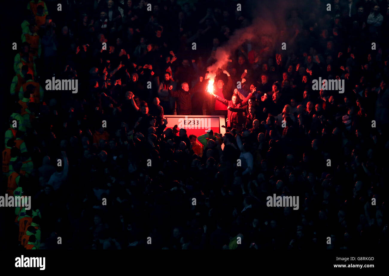 Liverpool fans let off a red flare in the stands during the UEFA Europa ...
