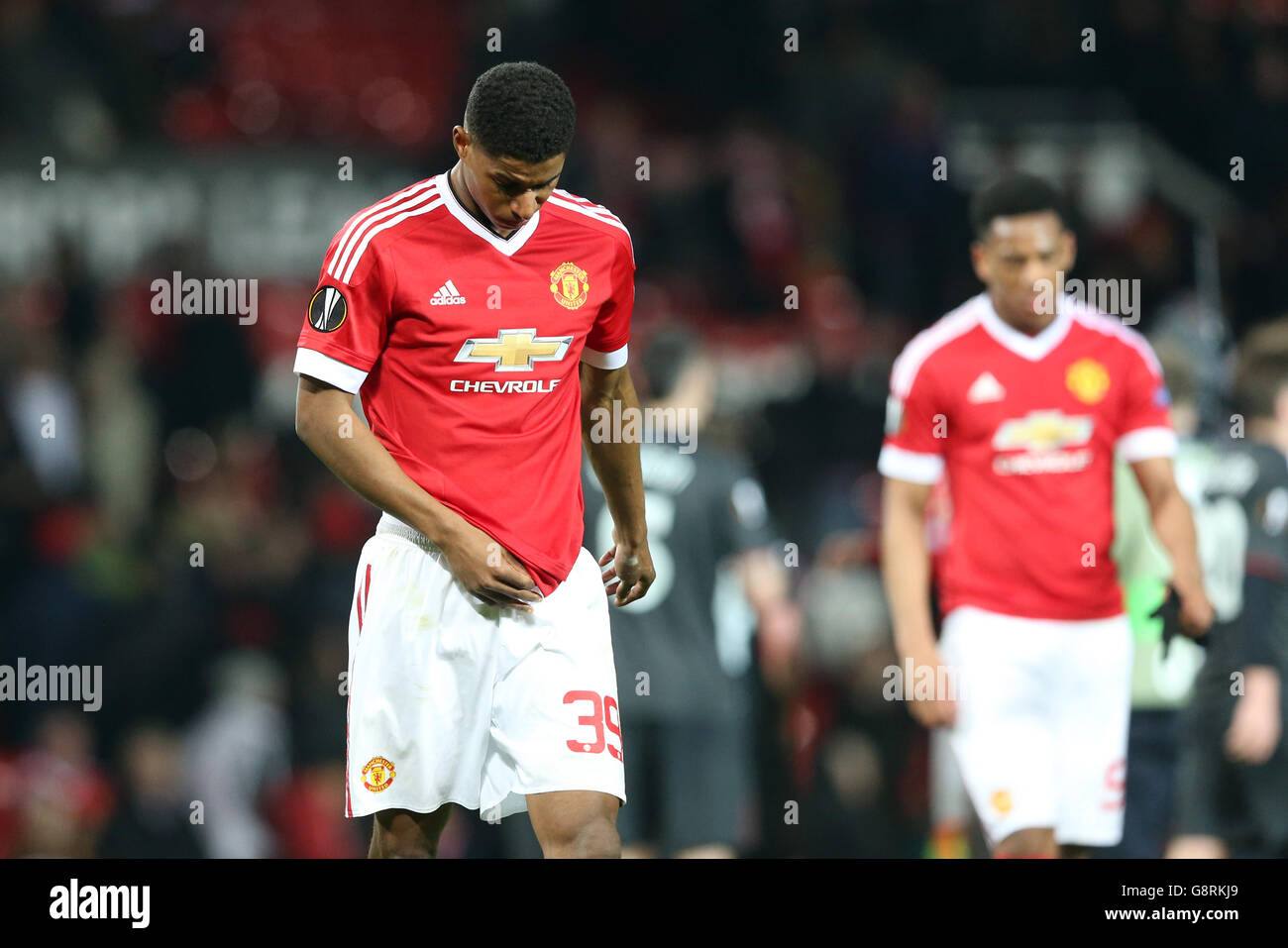 Manchester United's Marcus Rashford (left) and Anthony Martial walk off ...