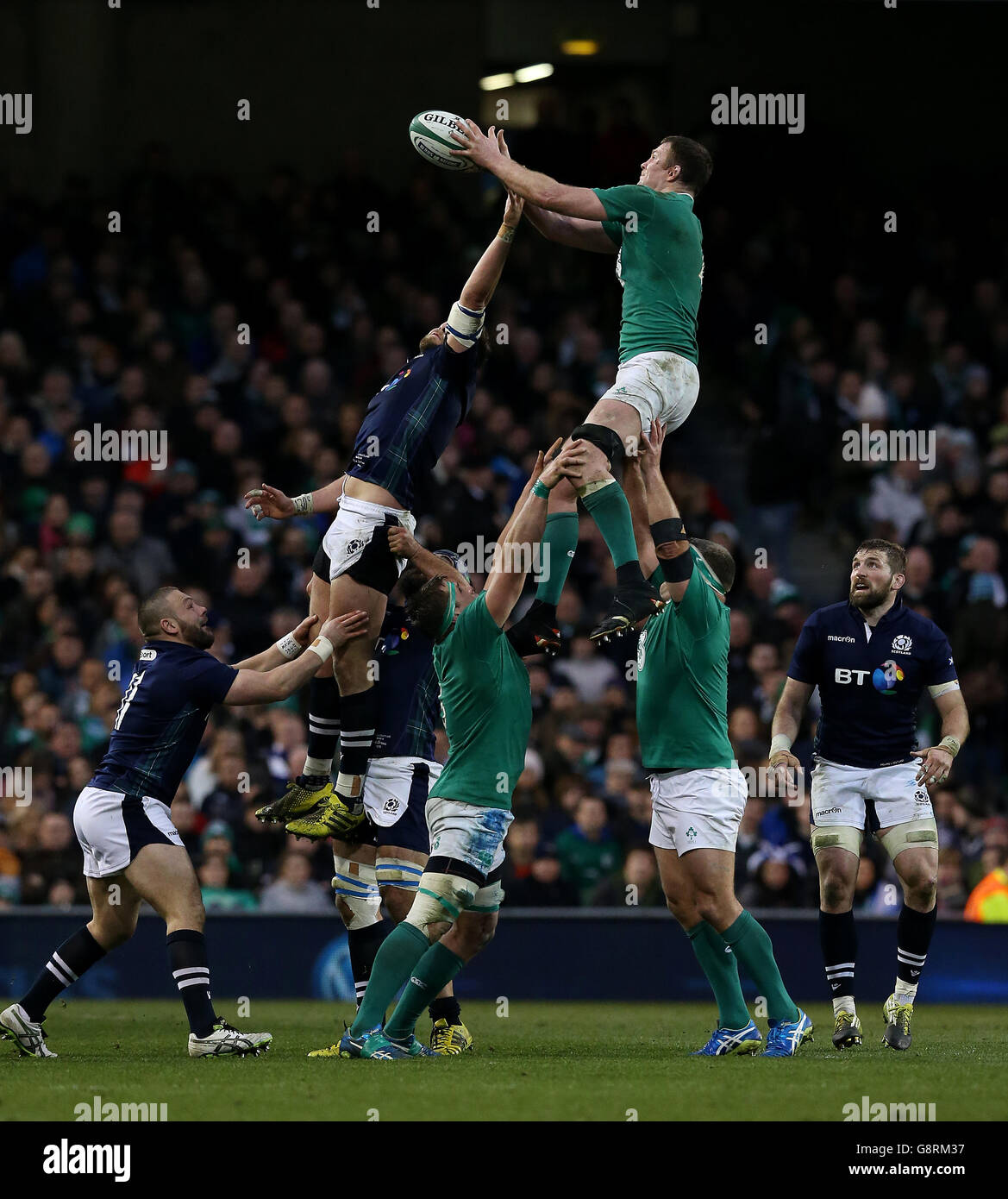 Ireland's Donnacha Ryan contests a lineout with Scotland's Richie Gray ...
