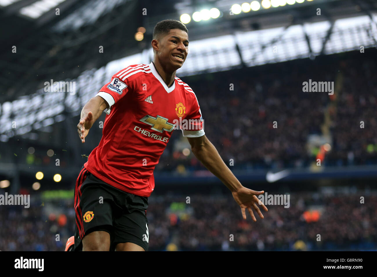 Manchester United's Marcus Rashford celebrates scoring his side's first ...