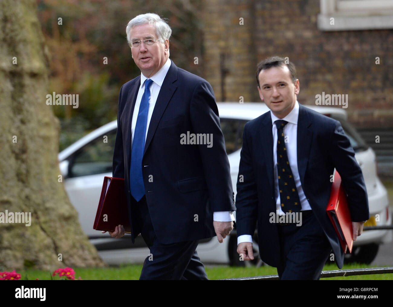 Defence Secretary Michael Fallon (left) arrives for a Cabinet meeting ...