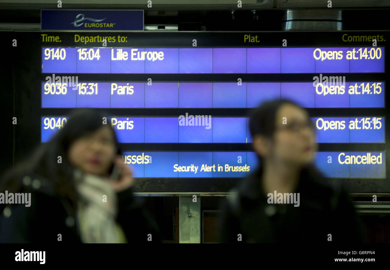 A notice board shows a cancelled train to Brussels by the Eurostar ...