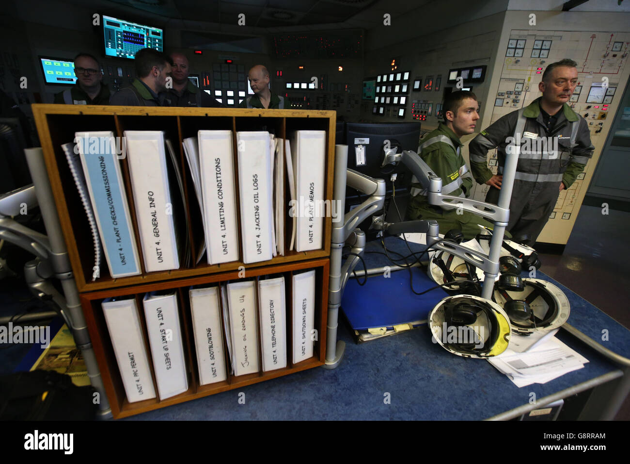 Workers at Longannet power station in Fife wait in the control room of ...