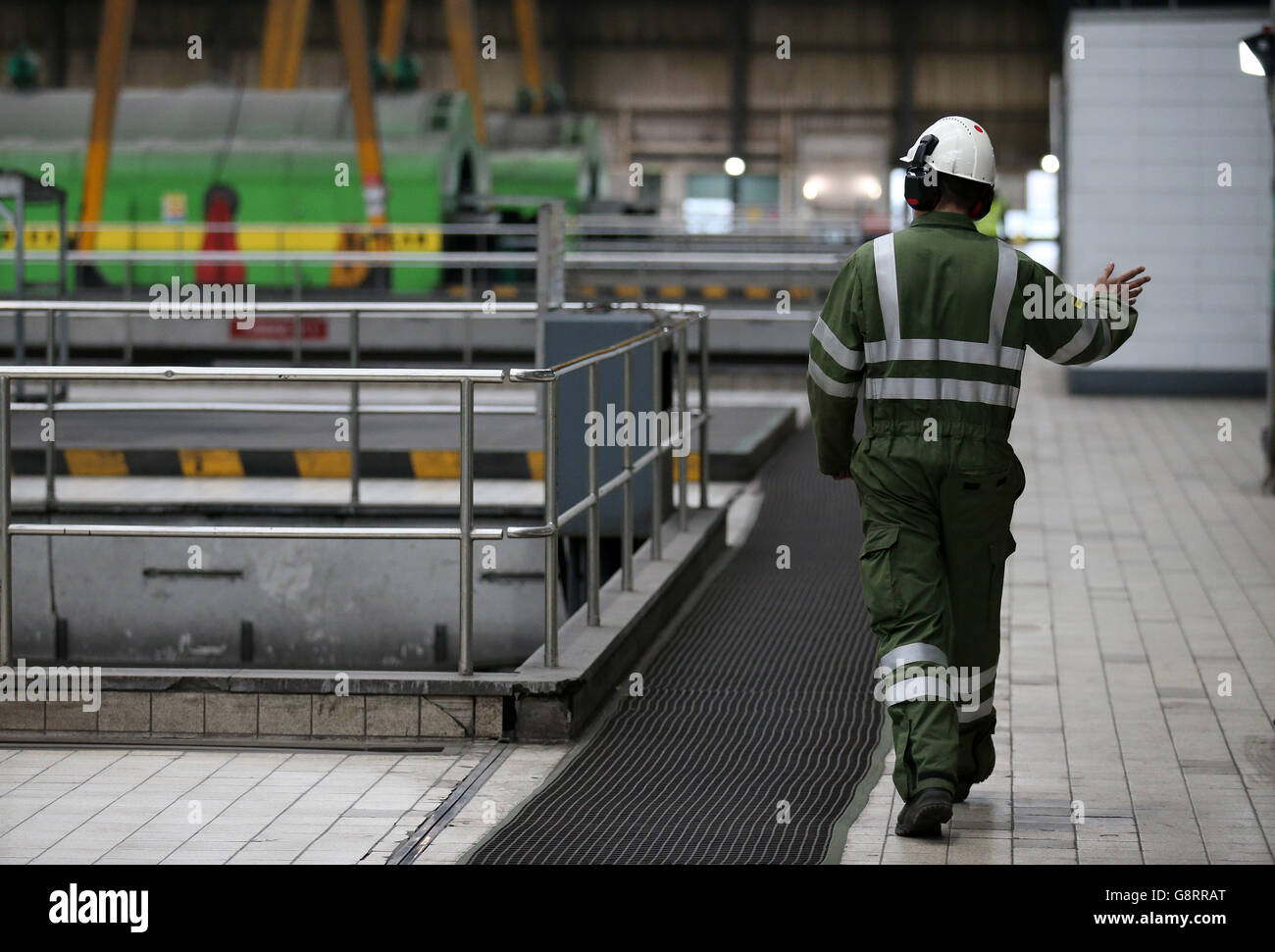 A worker at Longannet power station in Fife waves as he leaves the ...