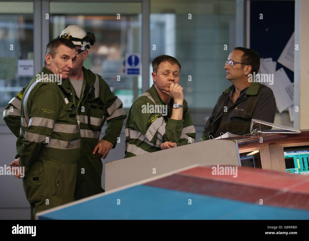 Workers at Longannet power station in Fife wait in the control room of ...
