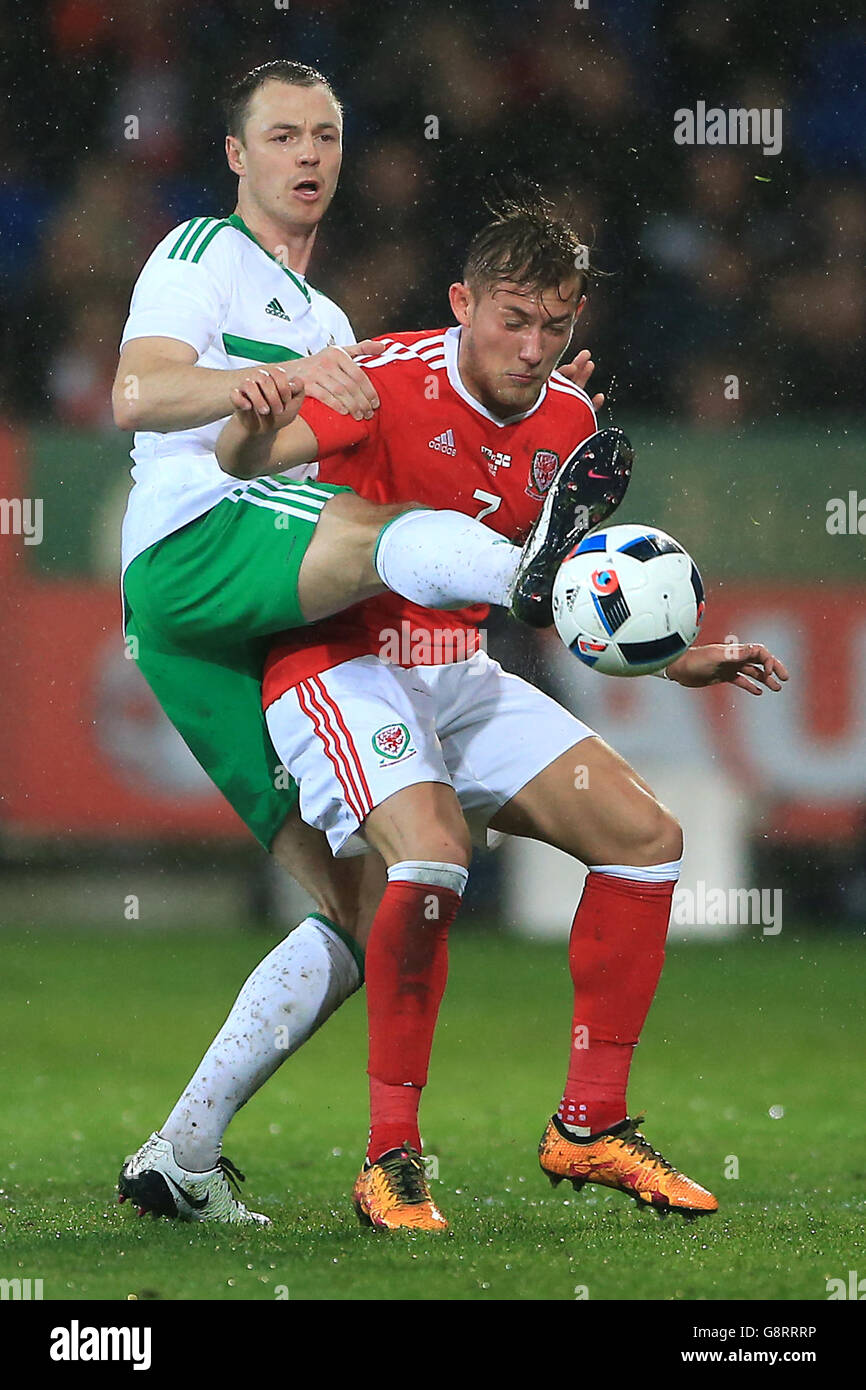 Northern Ireland's Jonathan Evans (left) and Wales' George Williams ...