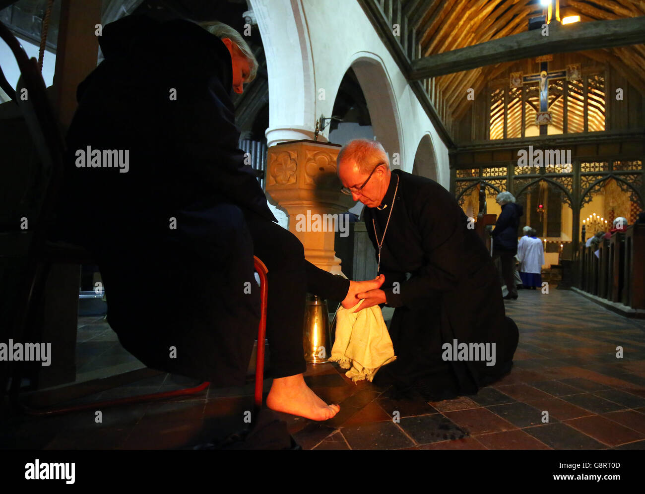 The Archbishop of Canterbury Justin Welby performs a foot washing ...