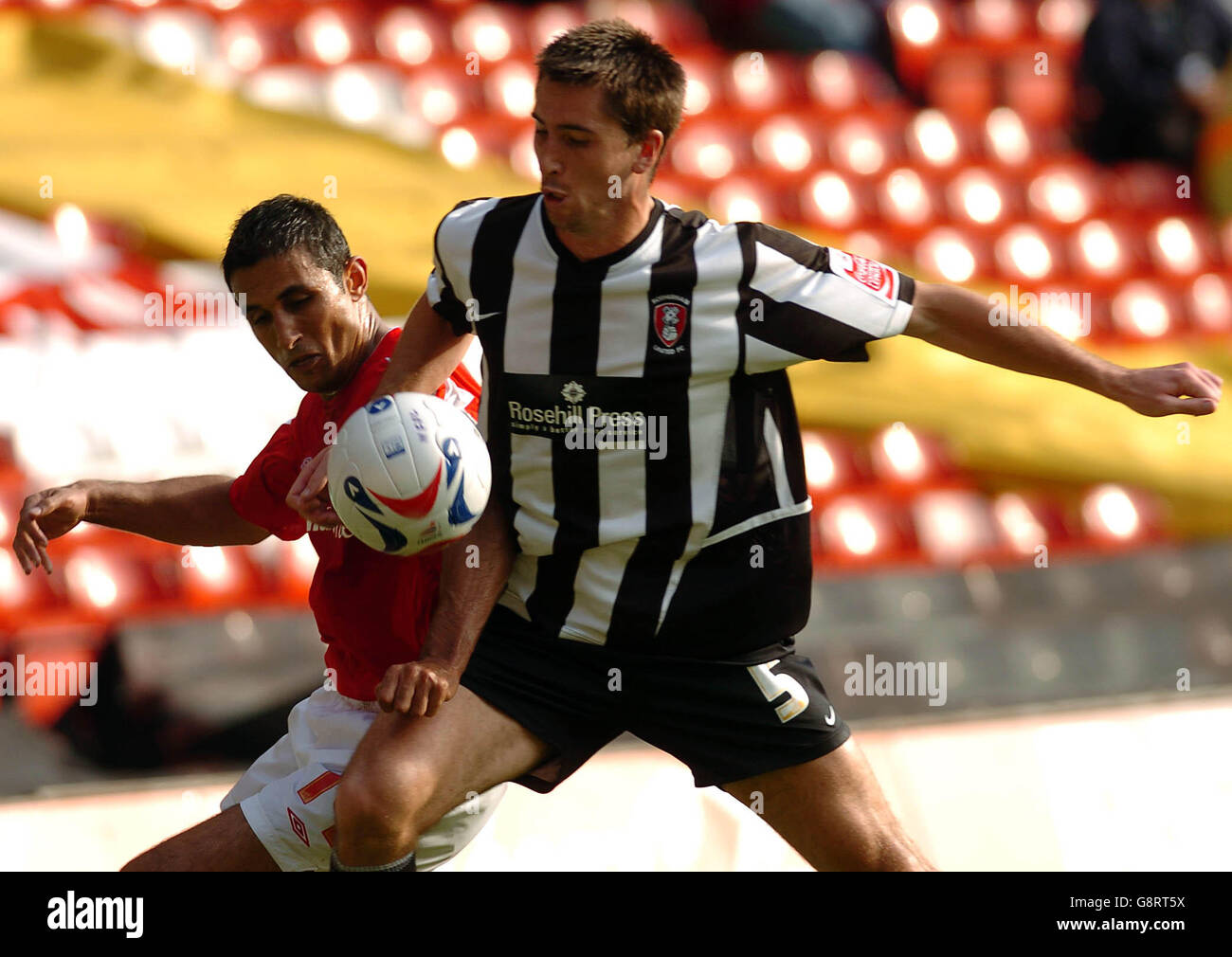 Nottingham forests jack lester challenges rotherham uniteds shaun barker hi-res stock ...